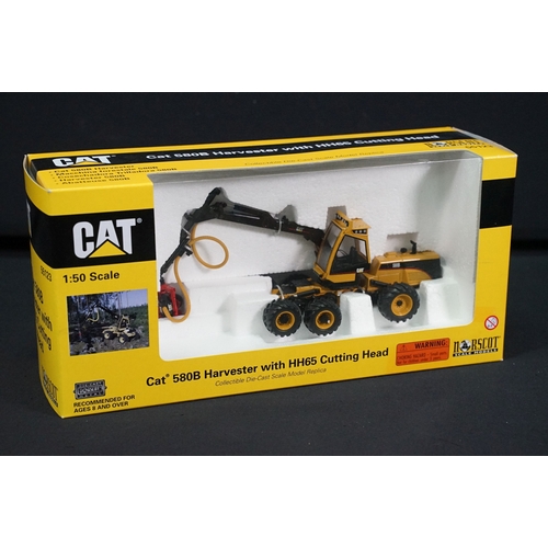 Four boxed commercial diecast models to include Norscot CAT 580B ...