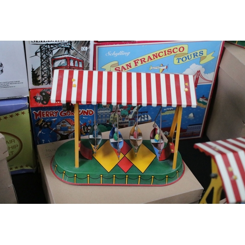 11 Boxed tin plate fairground related models to include Mechanical ...