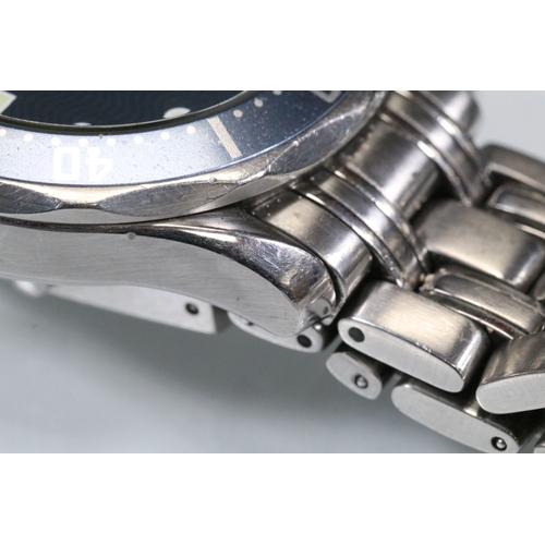 Omega Seamaster wrist watch having a round face with blue dial ...