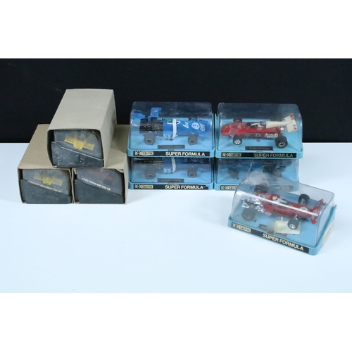 Eight cased Scalextric slot cars to include 3 x C121 Elf Tyrrell, 2 x ...