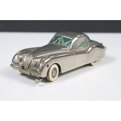 Prameta Jaguar XK120 diecast and clockwork model in chrome, some light ...