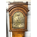 A figured walnut longcase clock by John Gordon of London, the arched ...