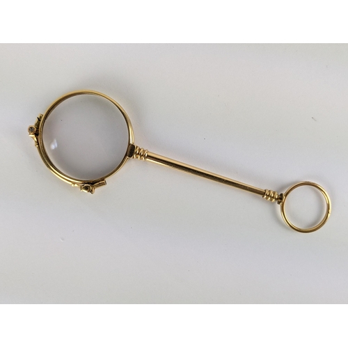 A pair of French gold mounted folding sprung lorgnettes with a loop to ...