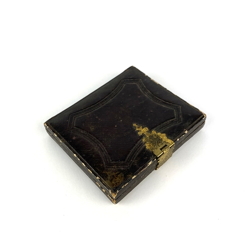 A Victorian tinted ambrotype portrait, of a standing female figure ...