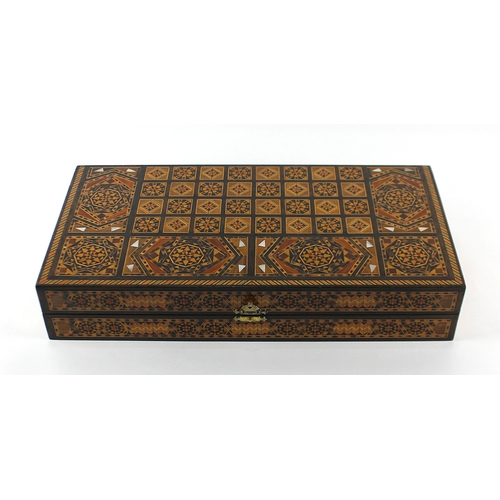 A vintage Damascus ware inlaid folding games box, outer chess board ...