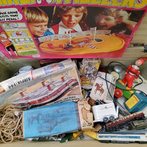 A farmhouse pine toy chest with contents, including Airfix S R.N4 ...