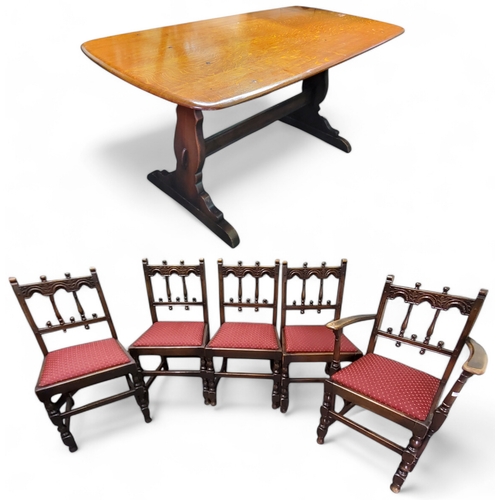 An Ercol blue label refectory dining table, 71 h x 153 l x 76cm w; five ...