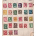 Stamps-A collection of mainly used world stamps in an old Strand Stamp ...