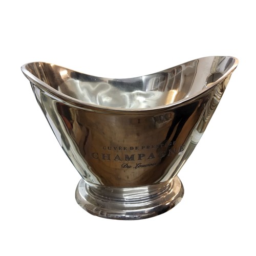 A contemporary champagne bucket, inscribed 'Cuvee de Prestige Champagne ...