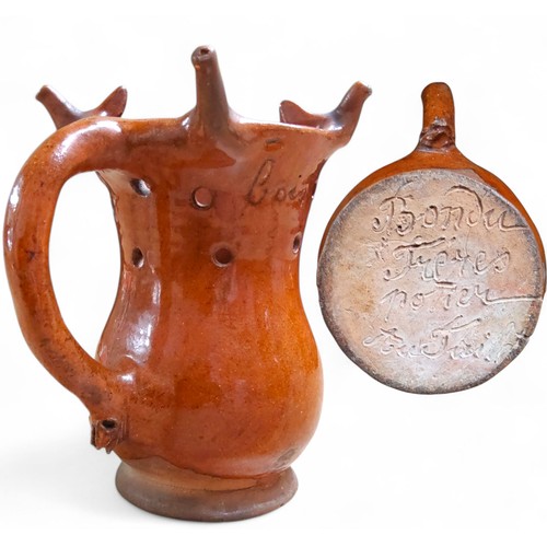 A French stoneware puzzle jug, bird spouts, loop handle, 15.5cm high ...