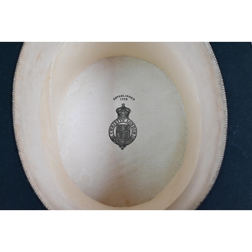 A Christie's of London black silk top hat in original box, stating size ...