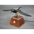 A brass, copper and leather 'Flying Mascot' automaton crow, probably ...