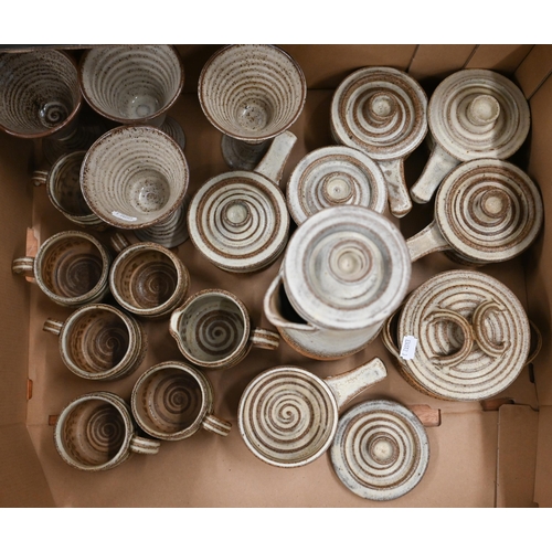 A studio pottery set of tableware, including four conical goblets ...