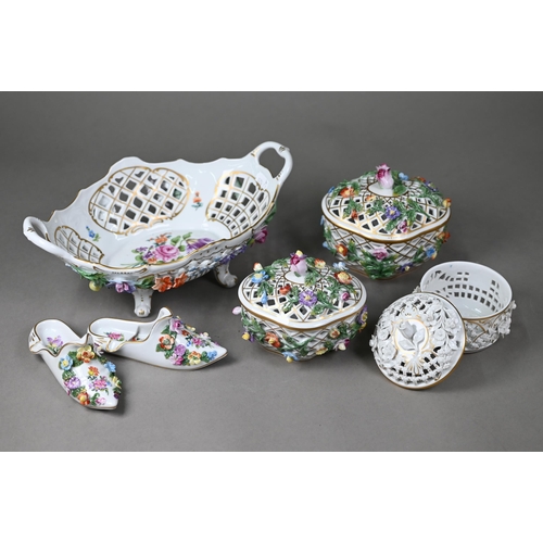 A graduated pair of Dresden floral-encrusted porcelain pot pourri pots ...