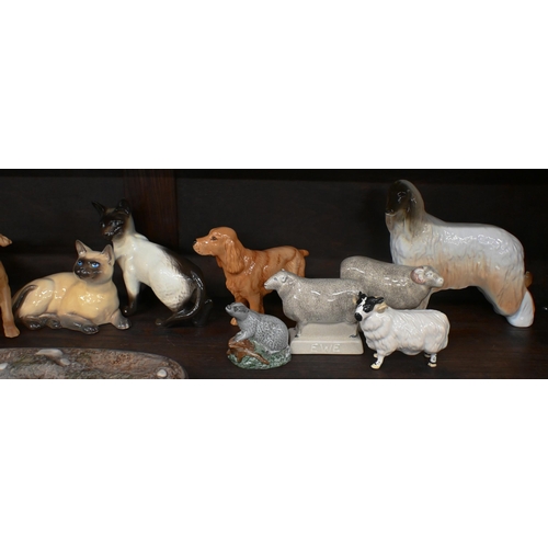 A collection of Beswick animals including Golden Eagle, 'The Spaniel ...