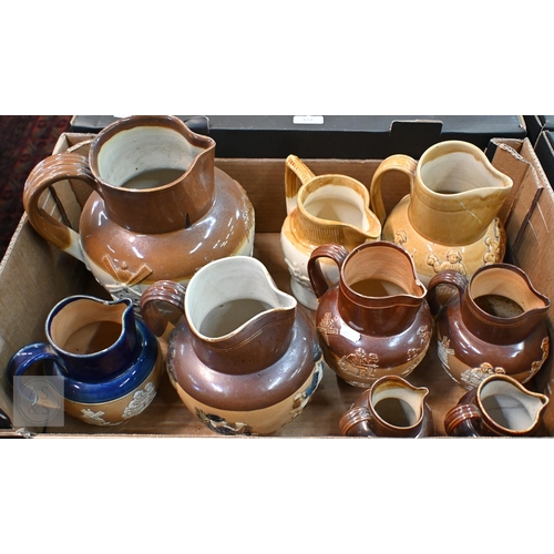 Nine various Victorian stoneware harvest jugs including Doulton ...