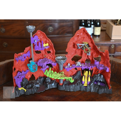 A Bluebird 'Mighty Max' Skull Mountain, to/w eighteen smaller toys from ...