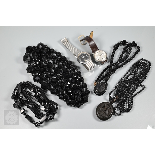 Four various Art Deco and earlier jet bead necklaces, one with leaf ...