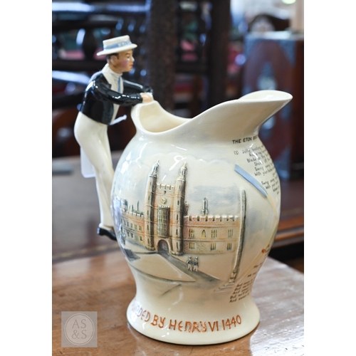 A Crown Devon Fieldings musical jug, Eton Boating song, 25 cm high