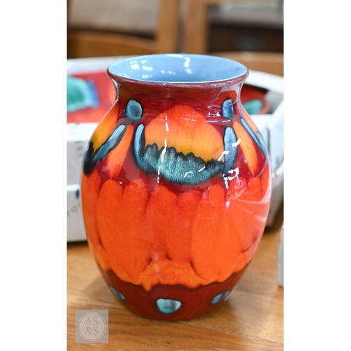 A large Poole Pottery 'Volcano' dish, 42 cm, to/w a 33 cm example and a ...