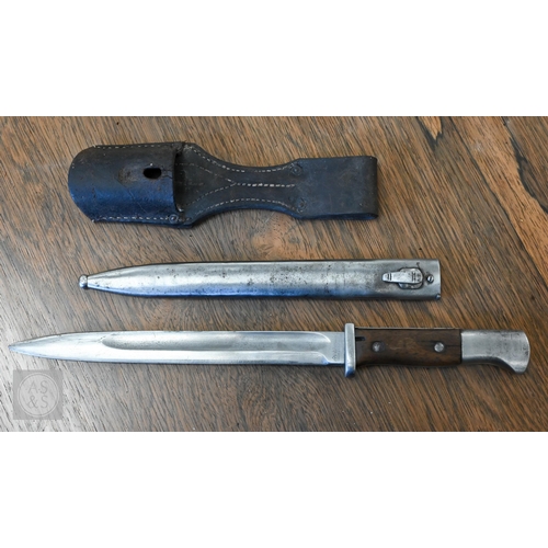 A World War II German bayonet with 25 cm fullered blade and steel hilt ...