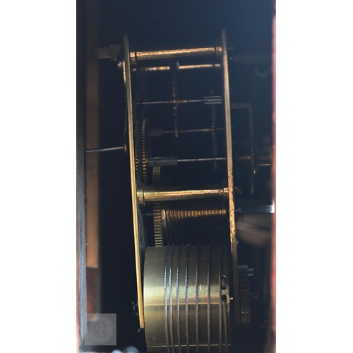 A Regency brass inlaid mahogany octagonal wall clock, with single chain ...