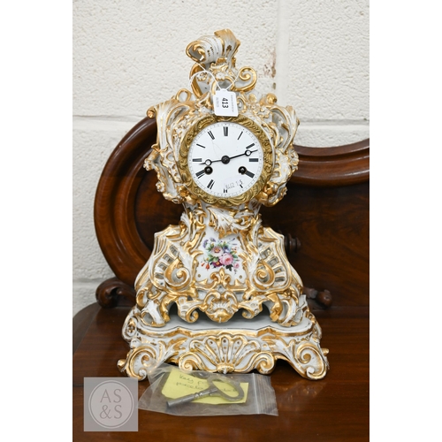 A Jacob Petit (Paris) Rococo Revival porcelain clock with gilt scrolls ...