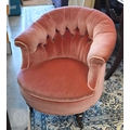 A Victorian mahogany tub armchair with pink dralon button back ...