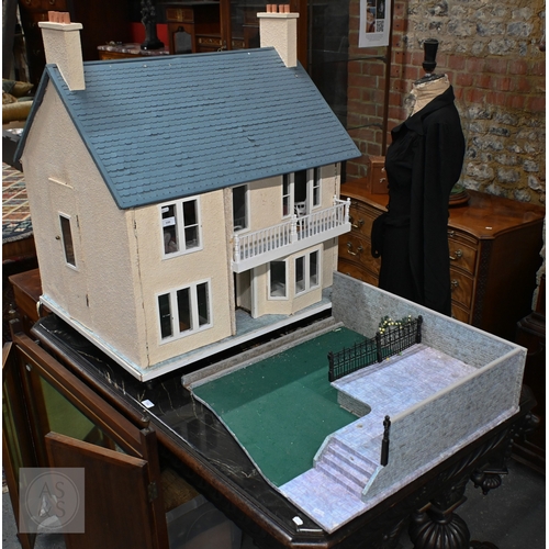 A vintage doll's house with contents, to/w a terrace and lawn, 92 cm ...