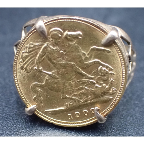 An Edward VII Half Sovereign 1902, mounted in a 9ct gold Ring, total ...