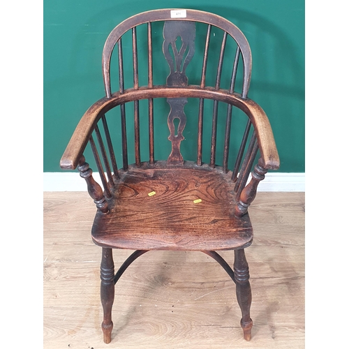 A 19th Century ash Windsor Elbow Chair with splat back raised on turned ...