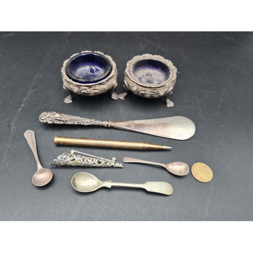 A pair of George III silver Cauldron Salts with floral embossing on ...