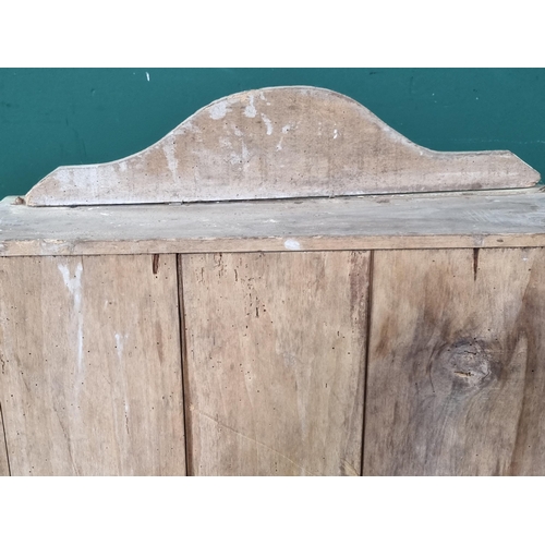 A green painted Wall Cupboard, with shaped pediment above pair of ...