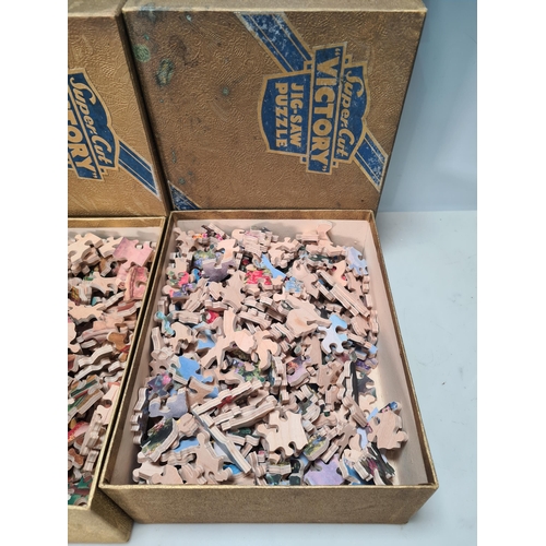 Four boxed "Super Cut Victory Jig-Saw" Puzzles including "Garden of ...
