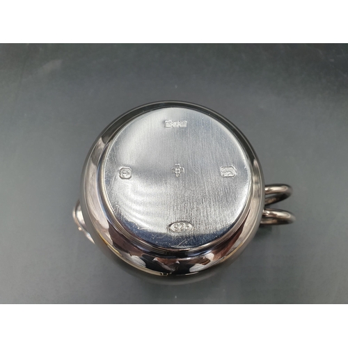 A modern silver designer Milk Jug with double loop handle, Birmingham ...