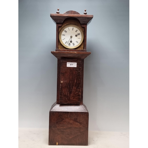 A miniature oak veneered Longcase Clock with white enamel dial 2ft 1in ...