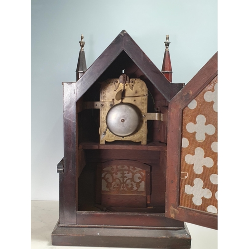 A 19th Century mahogany Gothic style Bracket Clock, with arched top ...
