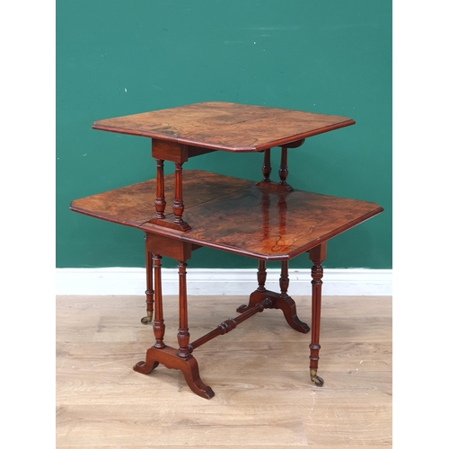 A late Victorian burr walnut two tier Sutherland Table with moulded and ...
