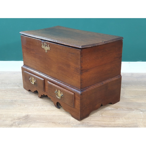 An 18th Century oak Welsh Coffer Bach with moulded top above two lower ...
