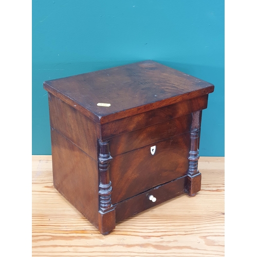 A 19th Century mahogany box in the form of a chest with hinged cover ...