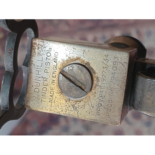A Dunhill Tinder Pistol Reg No - 794093, 4"High x 5.5"Long. (R4).
