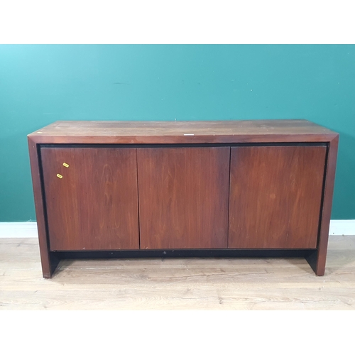 A mid Century Sideboard by Dillingham, fitted three cupboard doors ...