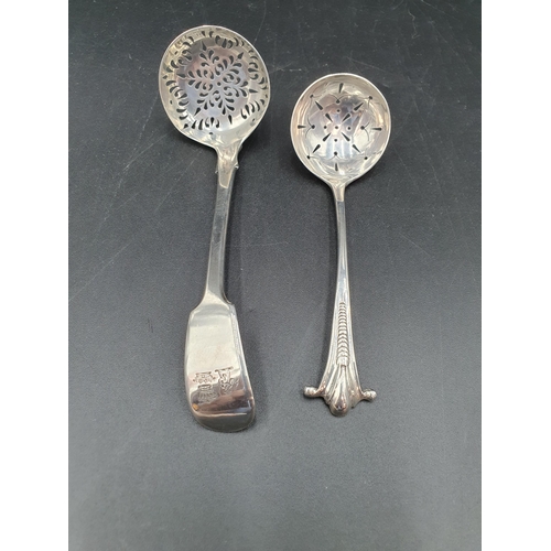 A William IV silver Sifting Ladle fiddle pattern engraved crest and ...
