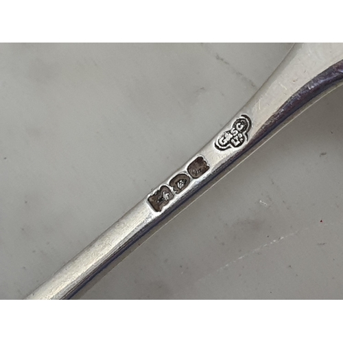 A William IV silver Sifting Ladle fiddle pattern engraved crest and ...