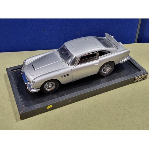 A large scale kit built Model of a James Bond Aston Martin DB5 with ...