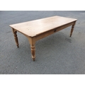 A pine Kitchen Table, with plank top, single fitted frieze drawer ...