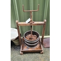 A wooden Apple Press Stand