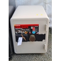 A Sentry Fire Safe with combination lock, 1ft 10in H x 17in W x 1ft ...