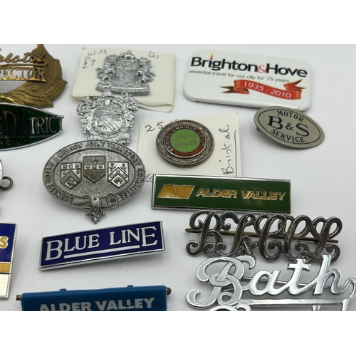 A collection of Bus Conductor and other Badges including 'Alexander ...