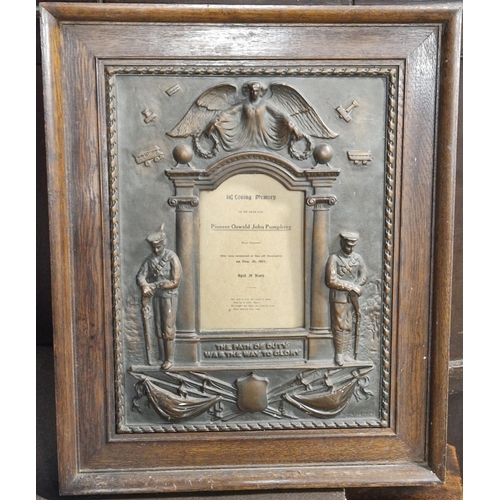 An 'In Memoriam' metal cast plaque for 'Pioneer Oswald John Pumphrey' d ...